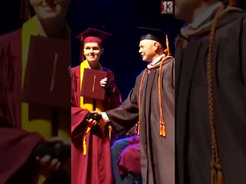 Teen who battled list of serious health problems walks at high school graduation