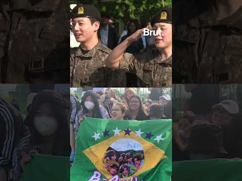 Fans greet BTS members Jungkook and Jimin as they complete mandatory military service