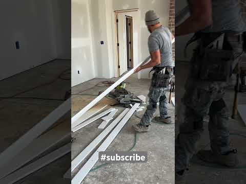 Cutting and installing baseboard trim #construction #baseboard #trim #drywall