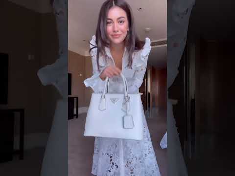 Francesca Hung styles the Aliyah Lace Butterfly Sleeve Midi Dress. #leolin #inbloom #shorts