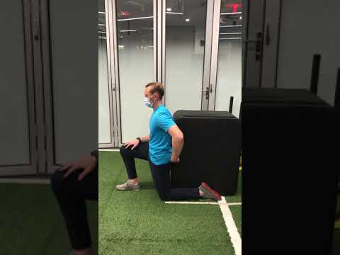 Corner-Assisted Half-Kneeling Hip Flexor Stretch to Do Before Golfing