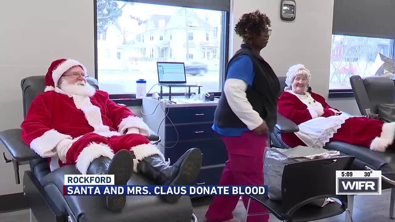 Santa and Mrs. Claus embrace the spirit of giving by donating blood at RRVBC