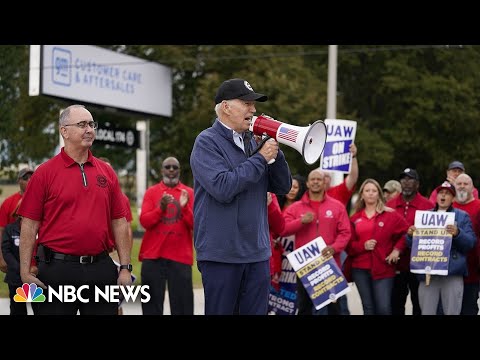 Biden makes history as he joins UAW picket line