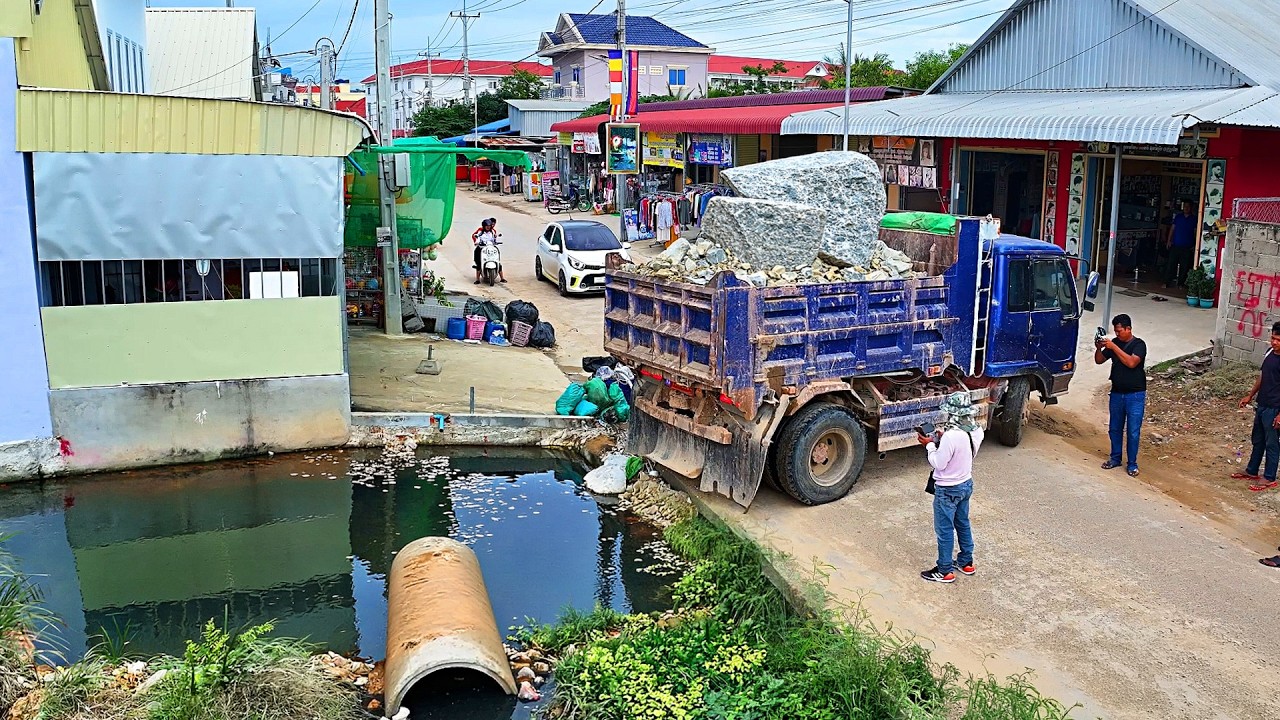 Start Whole new full project ! Bulldozer komatsu d20p push stone soil with dump truck unloading soil