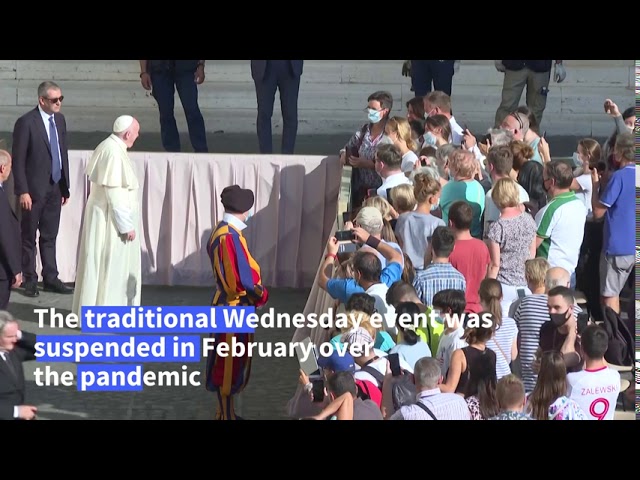 Pope Francis wears a face mask for the first time in public