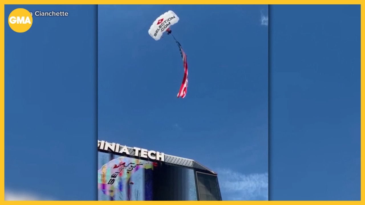 Skydiver speaks out after crashing into scoreboard at college football game