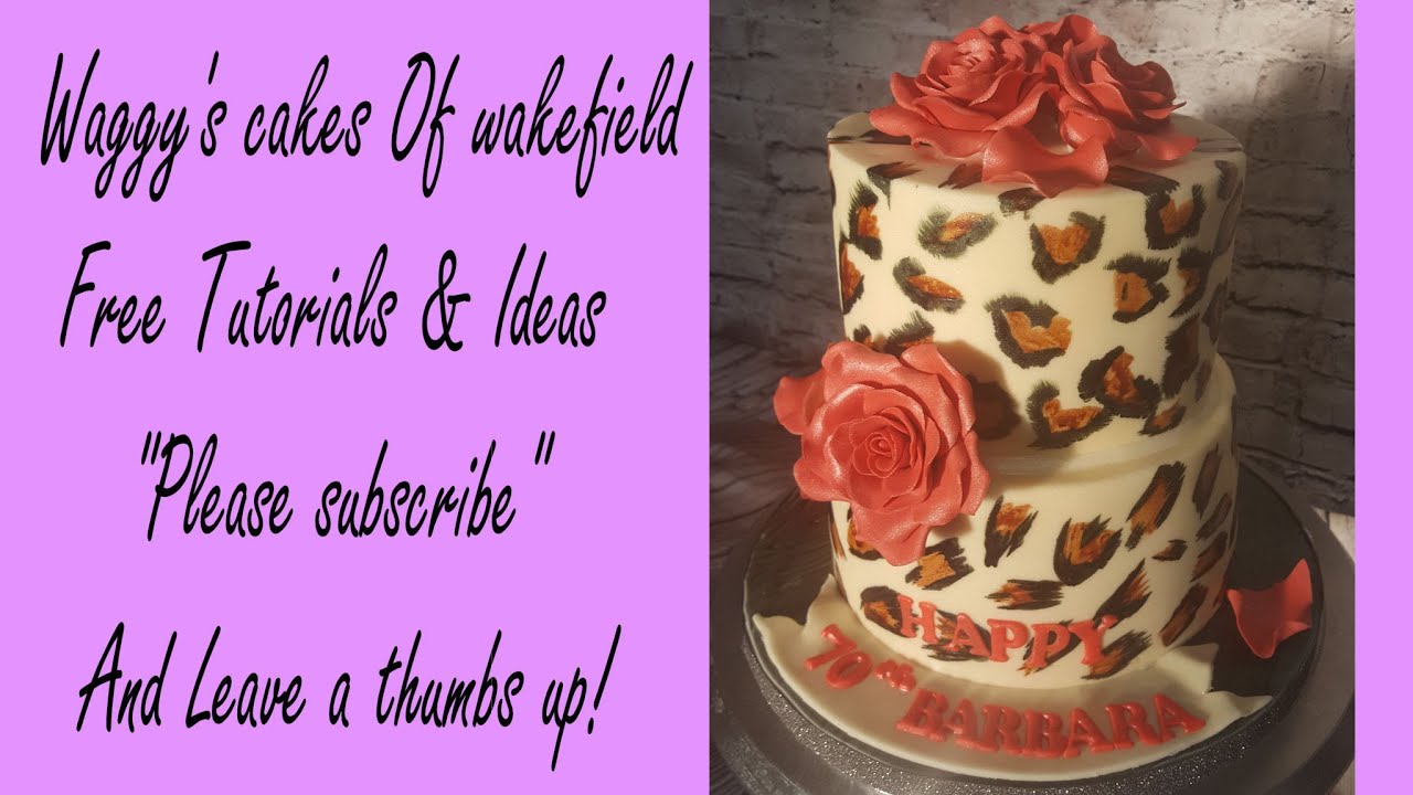 Painting leopard print onto a cake