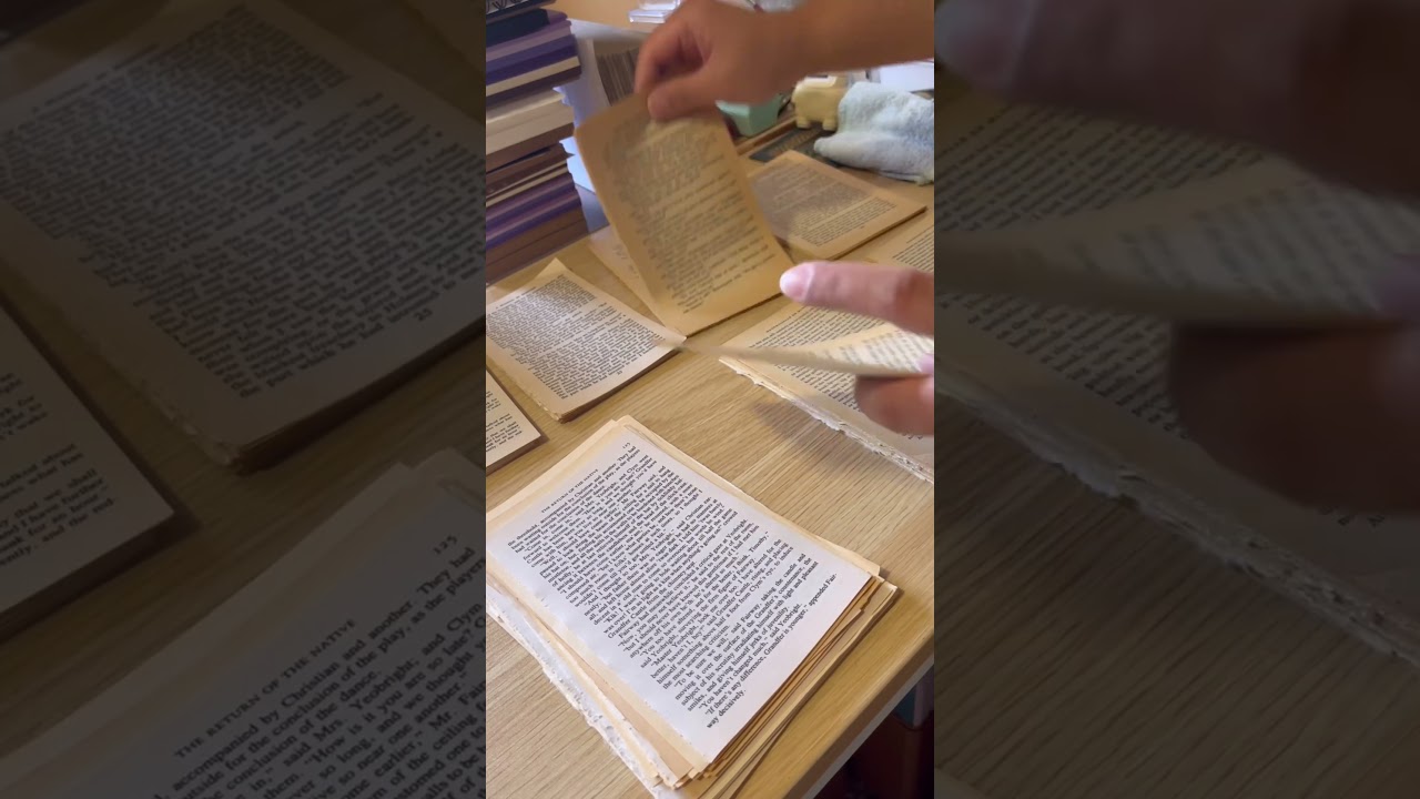 Hand picking vintage old book pages #vintagejournal #smallbusiness #oldbooks