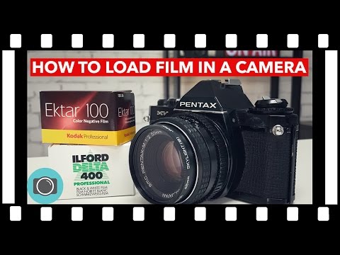 How to load 35mm film into an SLR camera