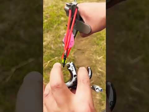Slingshot with red rubber band, super powerful and precise strike#slingshot #shooting #studio