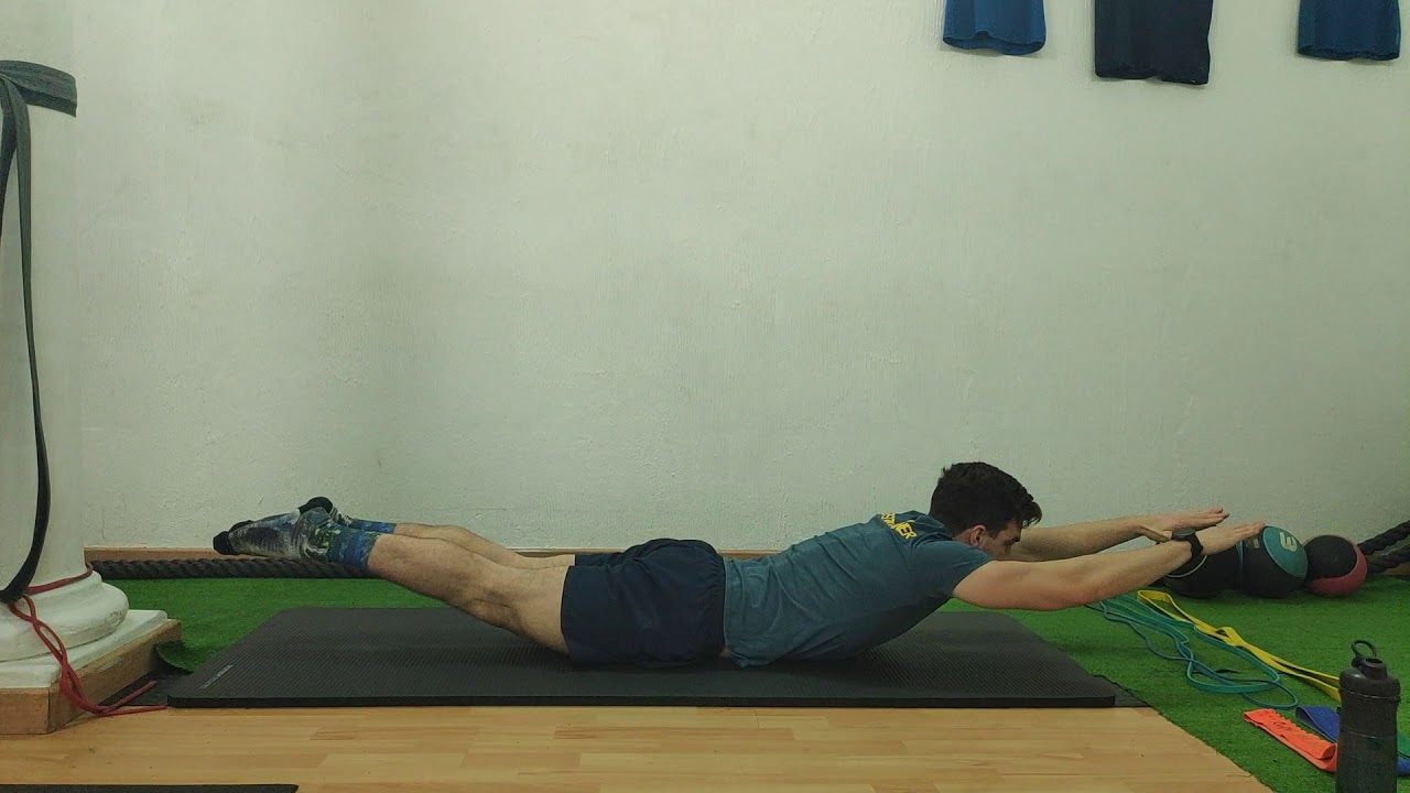 How to do: Supermans with Arm Extensions