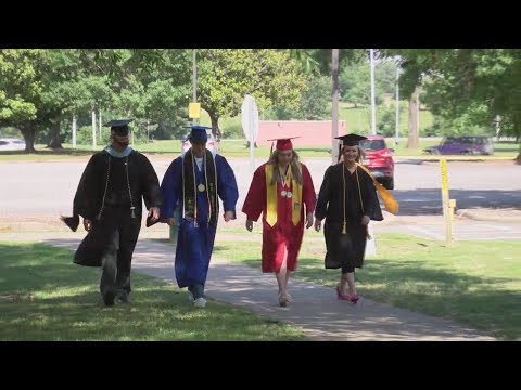 Couple graduates from Arkansas Tech at the same time as their kids