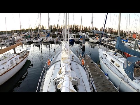 Docking Stern To. Long Keel Sailboat