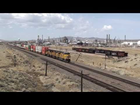(HD) Fast UP Stacker passes Sinclair Wyoming refinery