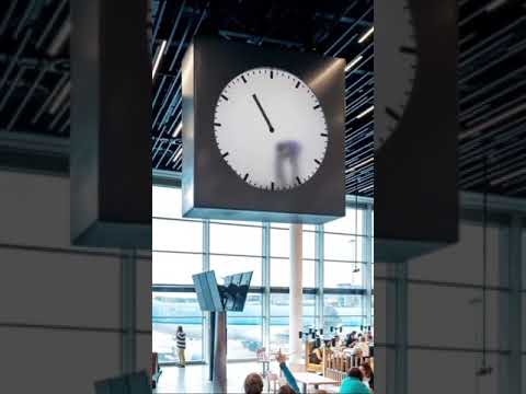 “This clock at the Schiphol Airport looks like it has a worker in it! It is in fact an art install