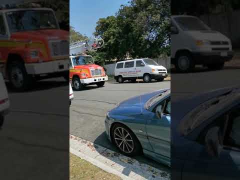 Queensland fire and rescue truck leaving the scene of a fire