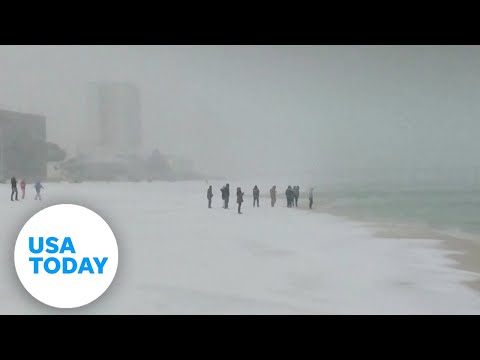 Florida, Alabama beaches covered in snow as winter storm hits South | USA TODAY