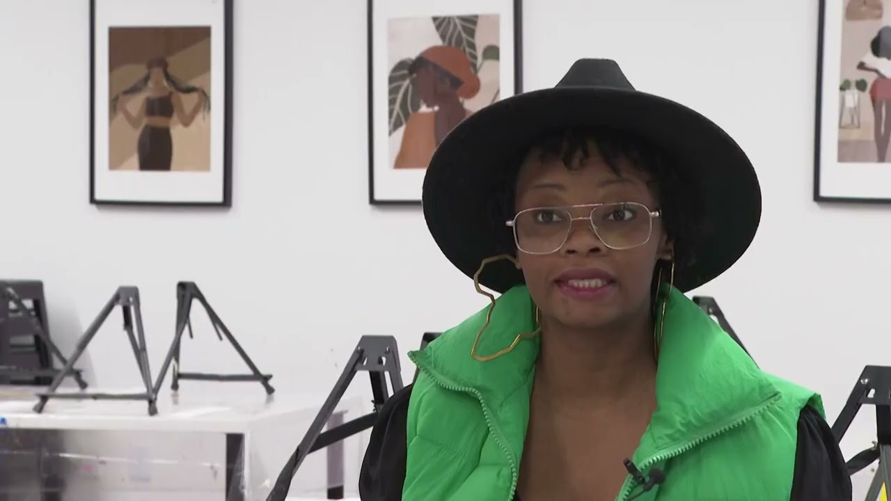 Artist tackles inflation, high interest rates