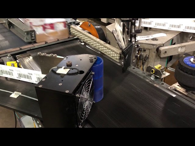 Model 252 Labeler - Printing and Applying Labels On Cartons of Water ...