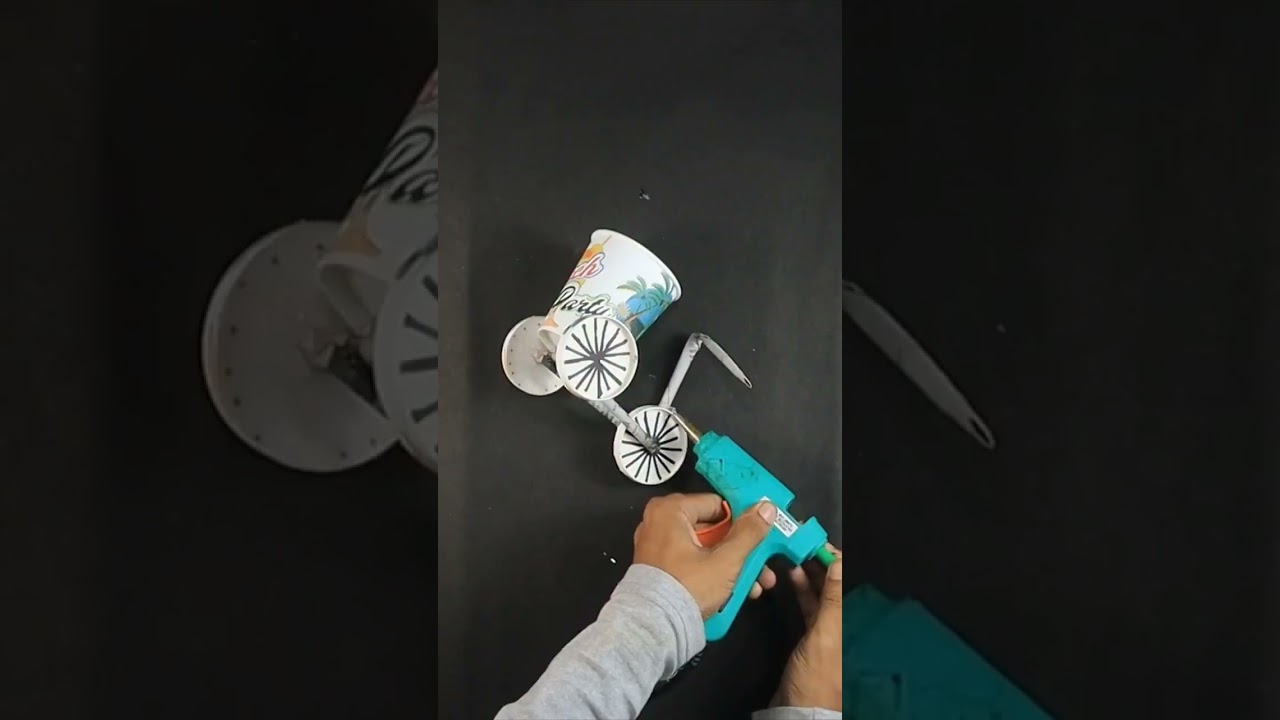 SUPW (Social useful productive work) Handmade cycle from waste cups and papers.