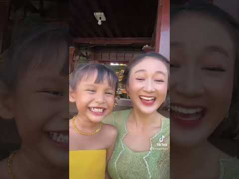 Balinese Mother Asks for Money