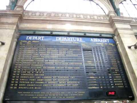 Train Station Departures Board Flipping Over