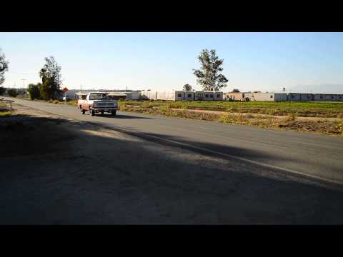 Dodge D100 318 open header drive-by