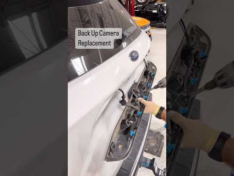 Ford Technician replaces backup camera on a Ford Explorer. #fordtech #technician #automotiverepair