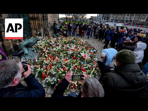 Flowers laid in Magdeburg to remember the victims of an attack at a Christmas market