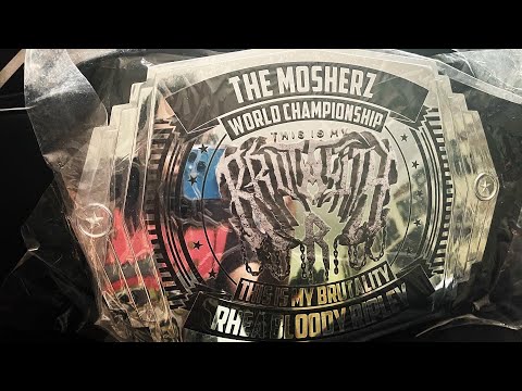 Rhea Ripley custom title belt from TrophySmack