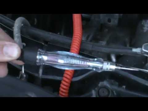 Checking The Wiring On The Air Conditioning Compressor
