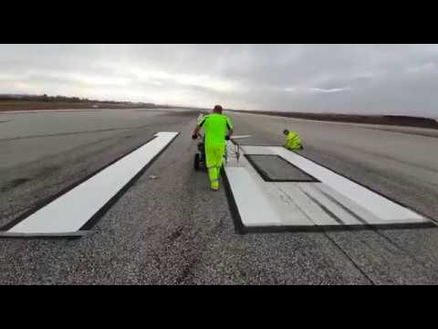 How numbers are painted onto runways
