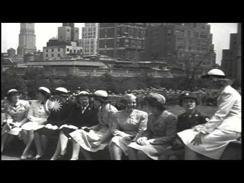 Girls join the Women's Army Corps and display newly designed uniforms in the Unit...HD Stock Footage