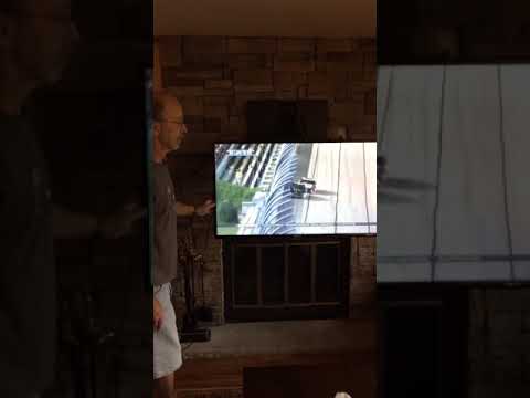 Over fireplace Dynamic TV Mount Down and Out with swivel