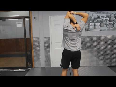 Standing Overhead Tricep Stretch | myworkouts.io