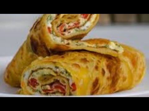 $1 Street food in Uganda |How to make a Ugandan Rolex