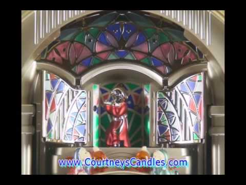QXM223BRH SEIKO MELODIES IN MOTION MUSICAL CLOCK