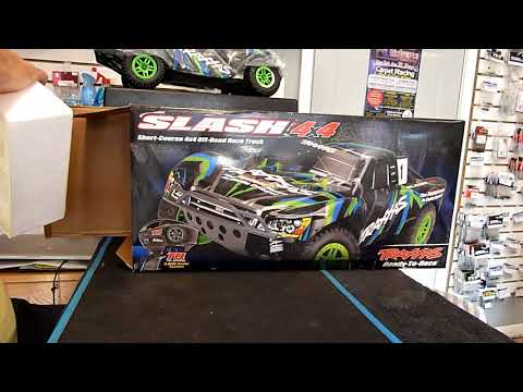 Bad Fast Hobbies unboxing the Traxxas Slash 4x4 Brushed Short Course Truck