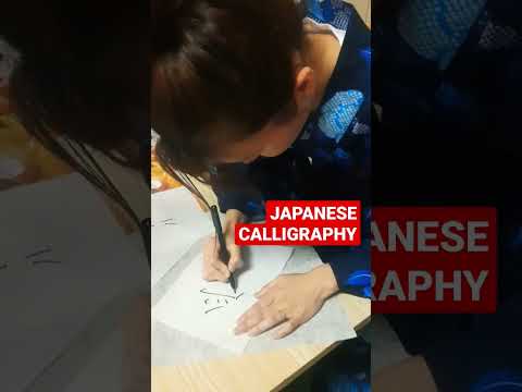 Aoi writing names in Japanese calligraphy