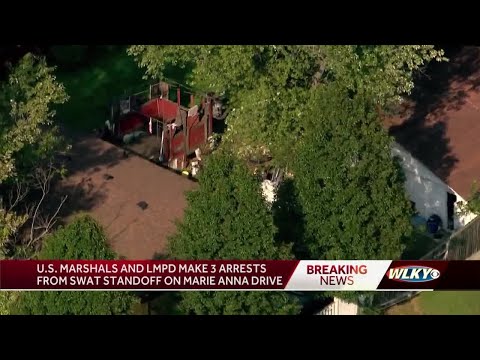Three taken into custody after standoff with U.S. Marshals, LMPD SWAT team off Cane Run Road