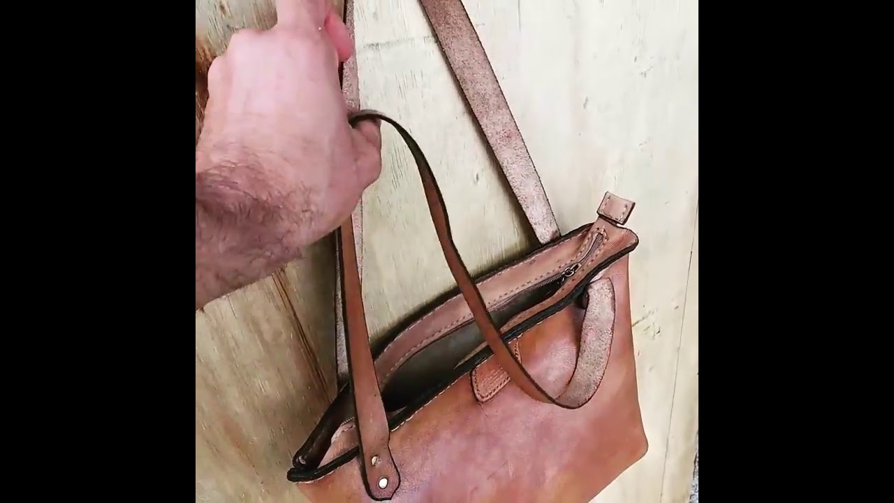 Bolsa feminina de couro legitimo.