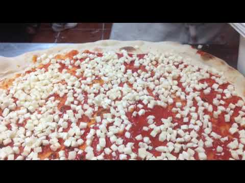 FREEDIO: "Cooking pizza " royalty free HD stock video footage