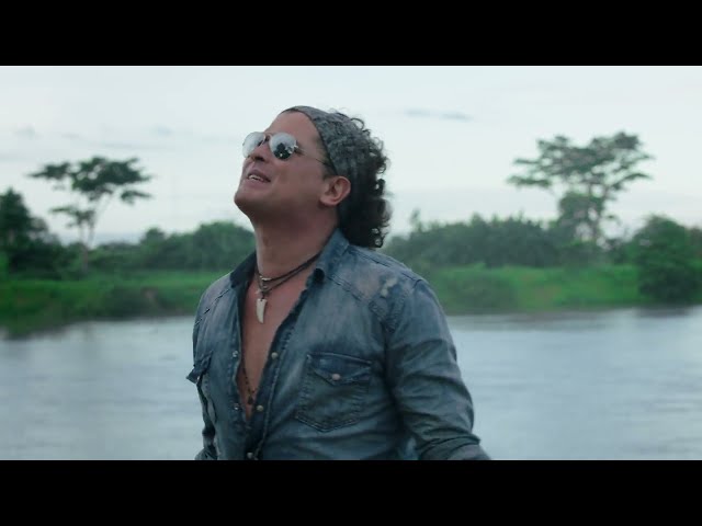 Carlos Vives - La Foto De Los Dos Letra y Videos Musicales