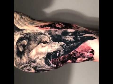 Amazing wolf and raven tattoo