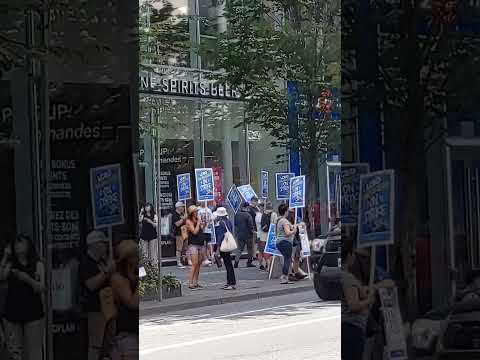 LCBO workers continue with their striking at Manulife Centre 55 Bloor Street West Toronto Ontario CA