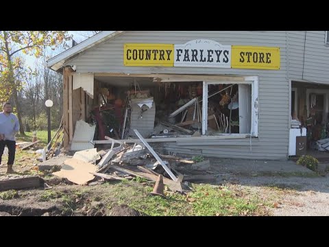 Geauga County Sheriff's deputy runs red light, collides with truck causing crash into local business