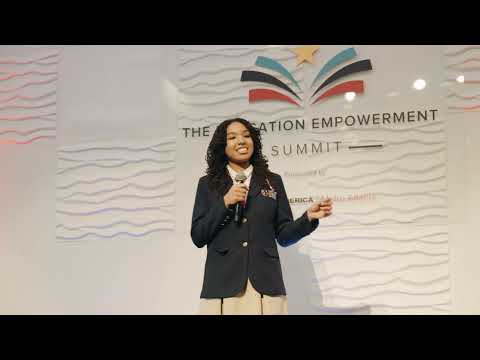 Veritas scholar Selah-Nina Webb introduces Brandon P. Fleming at Education Empowerment Summit