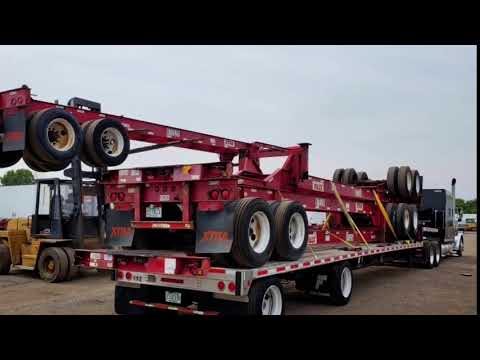 Stacking Container Chassis On A Step Deck Trailer / Four Container Chassis Stacked