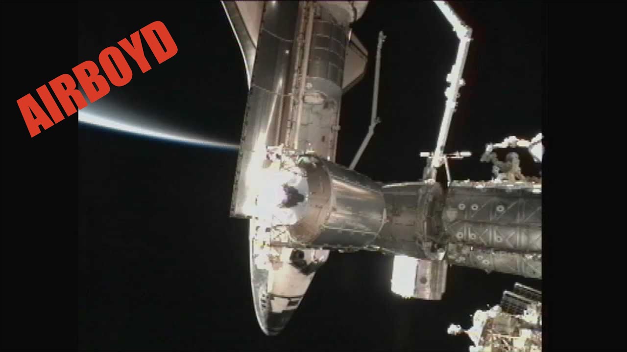 Space Shuttle Atlantis Docks With ISS (STS-135)