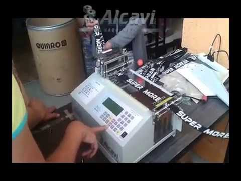 Maquina automatica para cortar elastico y cinta con alimentdor